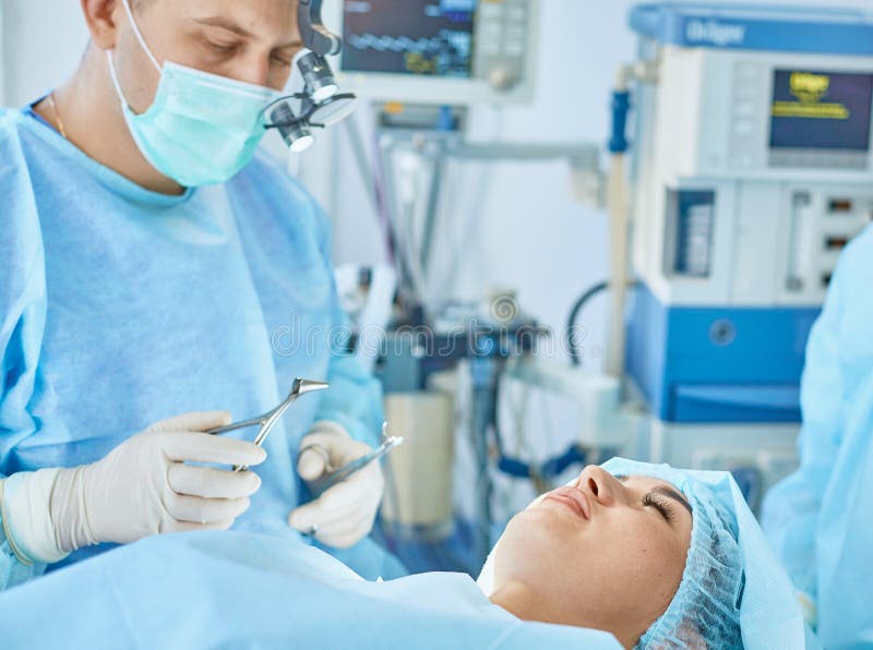 Several Doctors Surrounding Patient on Operation Table during T Stock ...