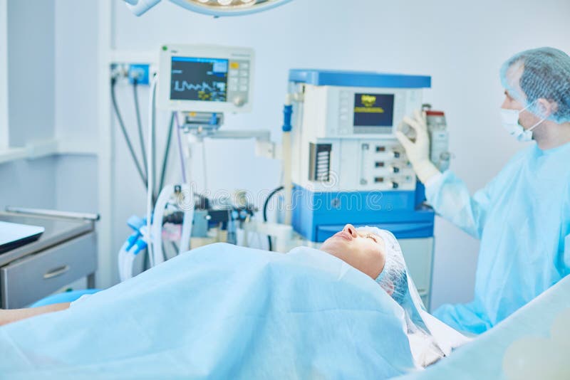Several Doctors Surrounding Patient on Operation Table during Their ...