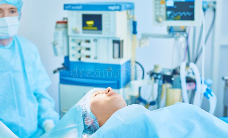 Several Doctors Surrounding Patient on Operation Table during Their ...
