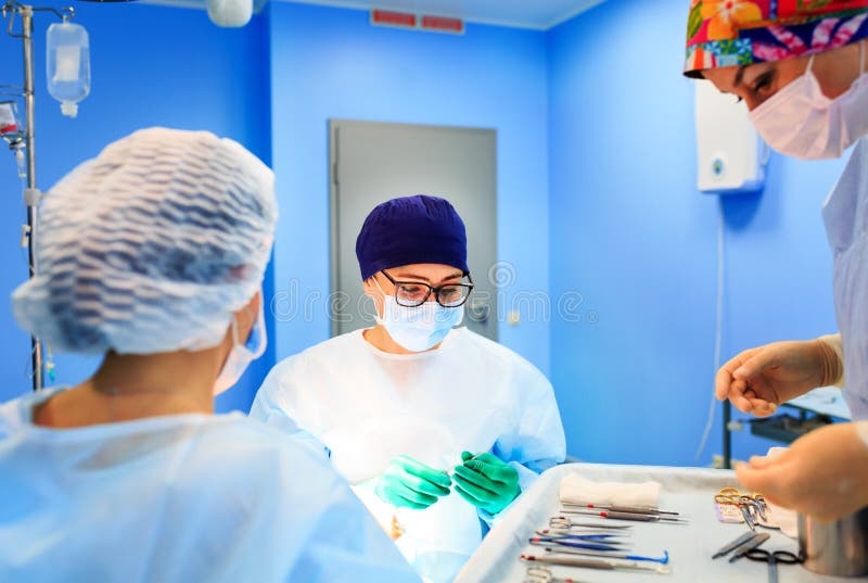 Surgeons Operating a Patient in Operating Room Stock Image - Image of ...