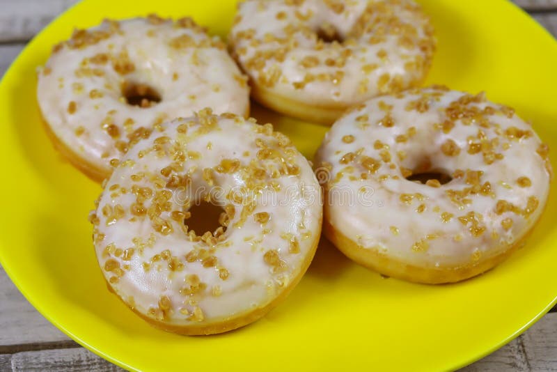 Donuts on a plate stock photo. Image of fried, candy - 178680264