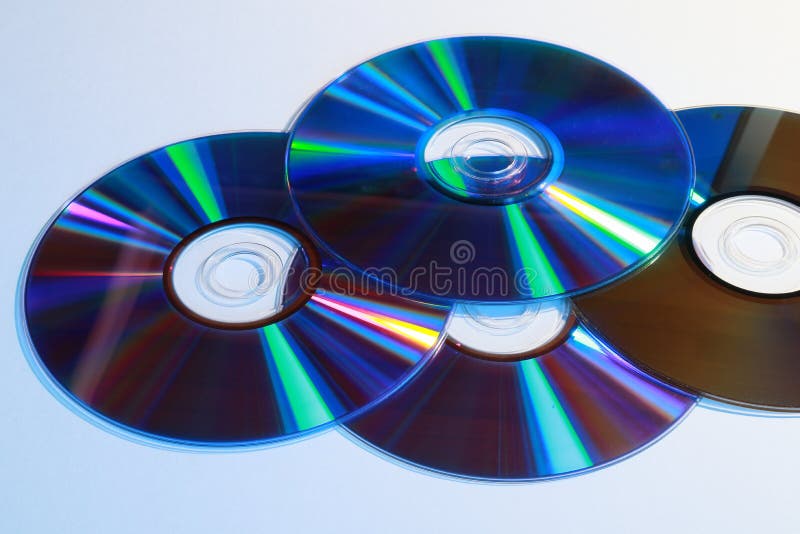 Several DVDs in Reflected Light. Stock Photo - Image of dvds, variety ...