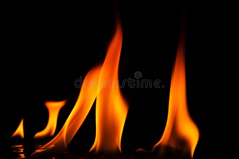 Several Fire Flames with Delicate Reflection Stock Photo - Image of ...