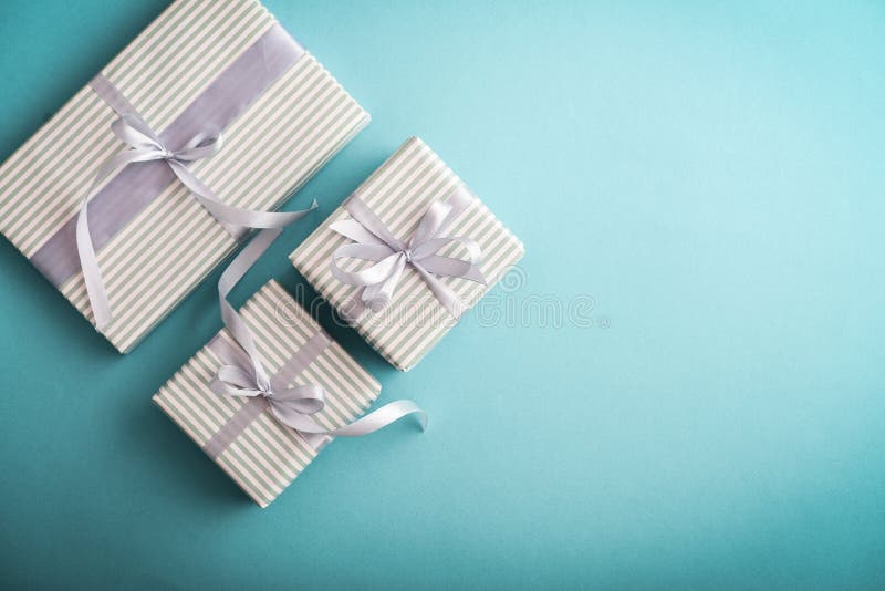 Several Gift Striped Boxes with Grey Ribbon Stock Image - Image of ...