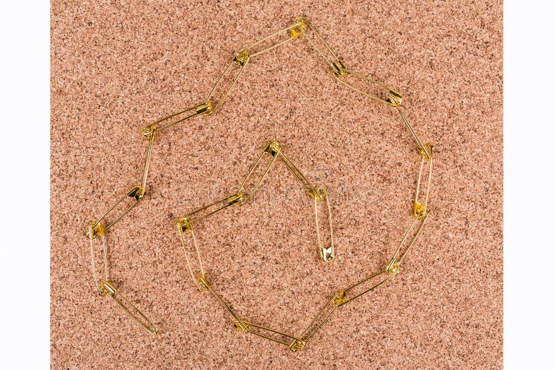 Several Gold Safety Pins Chained Stock Photo - Image of gold, object ...