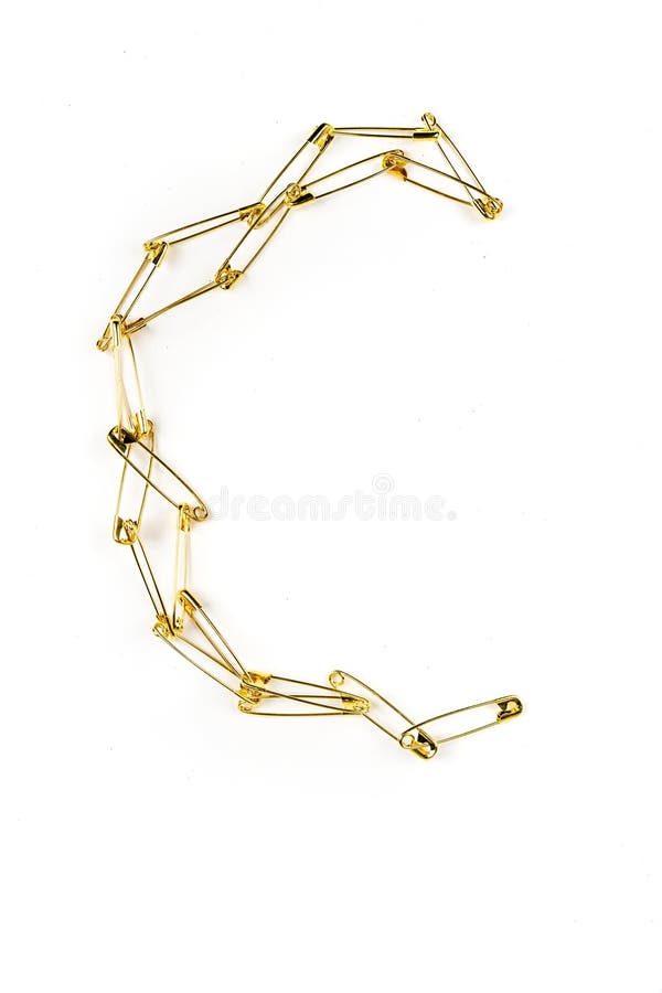 Several Gold Safety Pins Chained Stock Photo - Image of shiny, natural ...