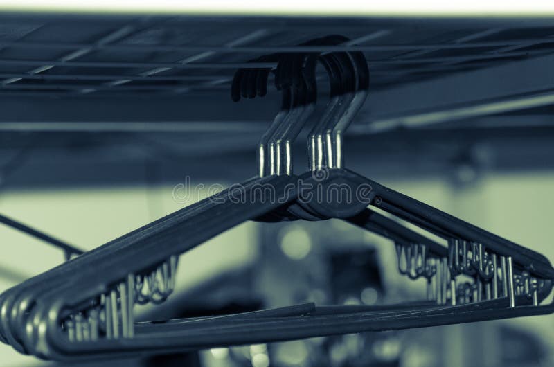 Several Hangers Hang on the Rack Stock Image - Image of blank, closeup ...