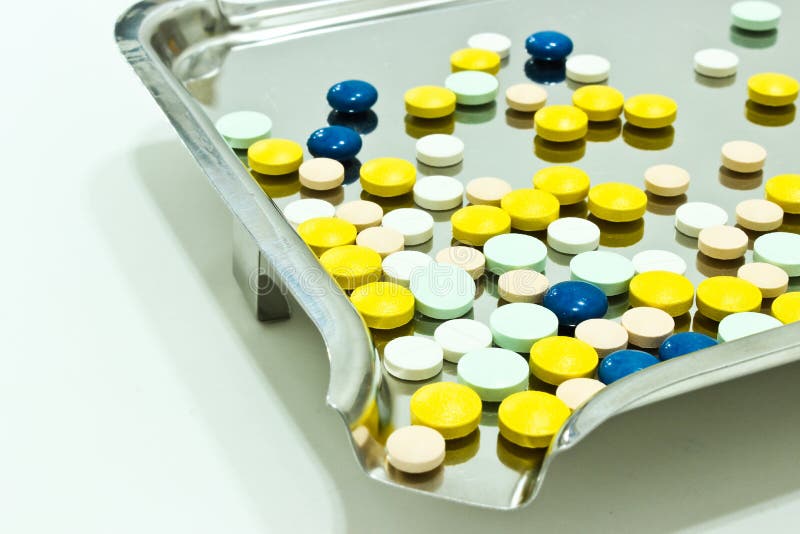 Drug Tablets on the Medication Tray Isolated on the White Background ...