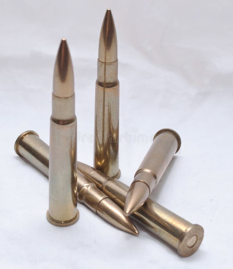Large Caliber Rifle Bullets on a White Background Stock Image - Image ...