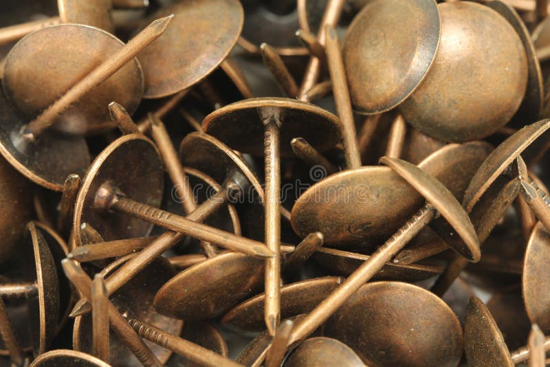 Several large copper nails stock image. Image of anodized - 63409275
