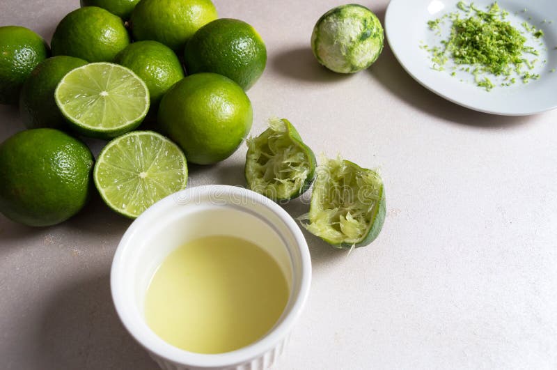 Several Lemons on a White Background and One Fruit Split Showing the ...
