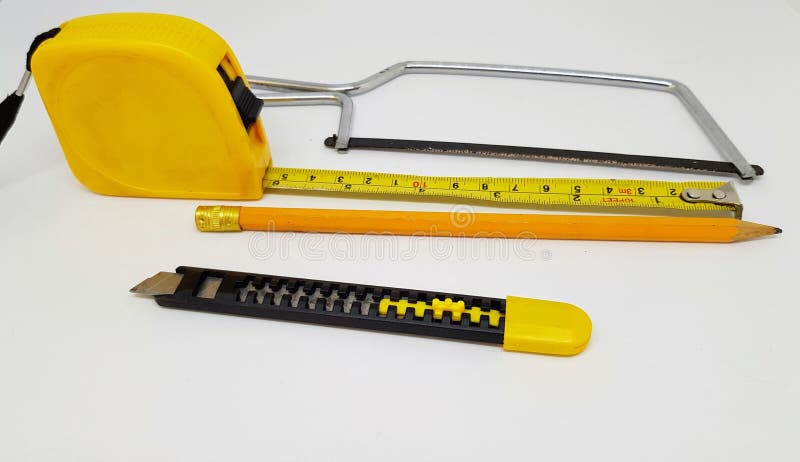 Mechanical Tools, Including a Measuring Tape and Pencil, Next To Each ...
