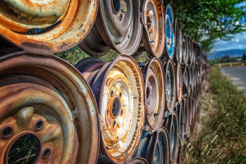 Metal Car Hubcaps Forming a Wall Stock Photo - Image of icon, auto ...