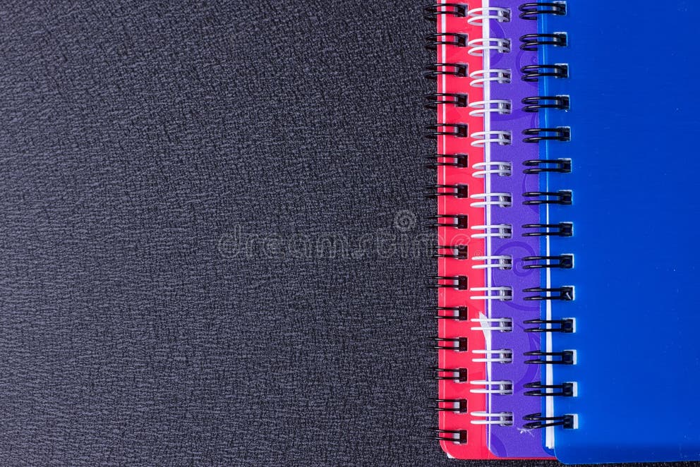 Several Multi-colored Notebooks on a Spiral Stock Image - Image of ...