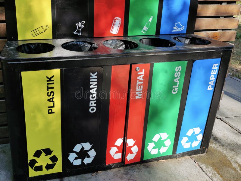 Several Multi-colored Plastic Containers Stand for Separate Garbage ...