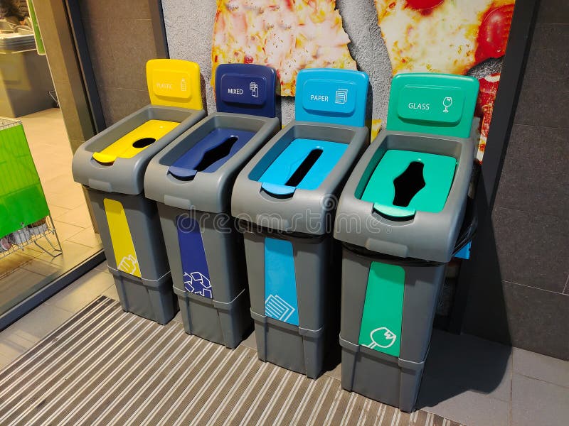 Several Multi-colored Plastic Containers Stand for Separate Garbage ...