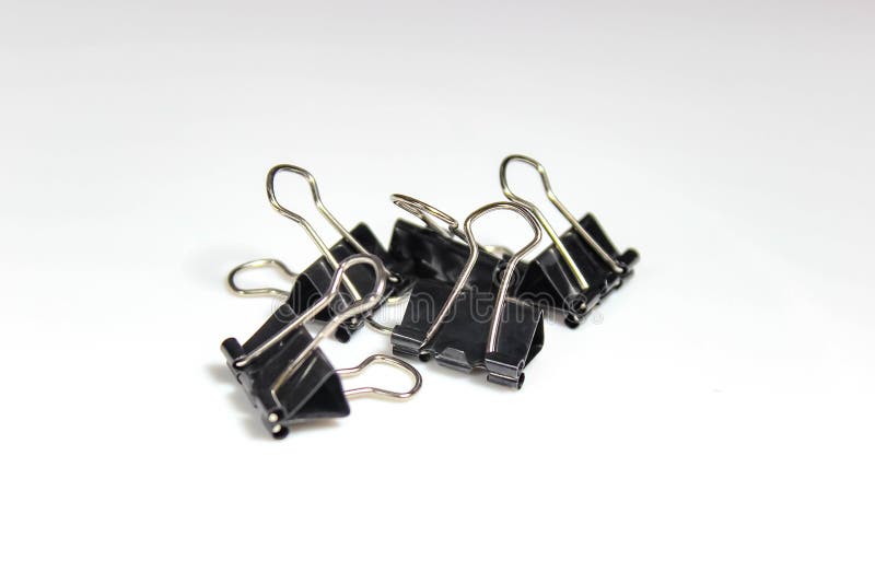 Several Office Black Paper Clips on a White Background Stock Image ...