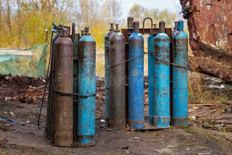 Several old gas cylinders. stock image. Image of industrial - 134749207