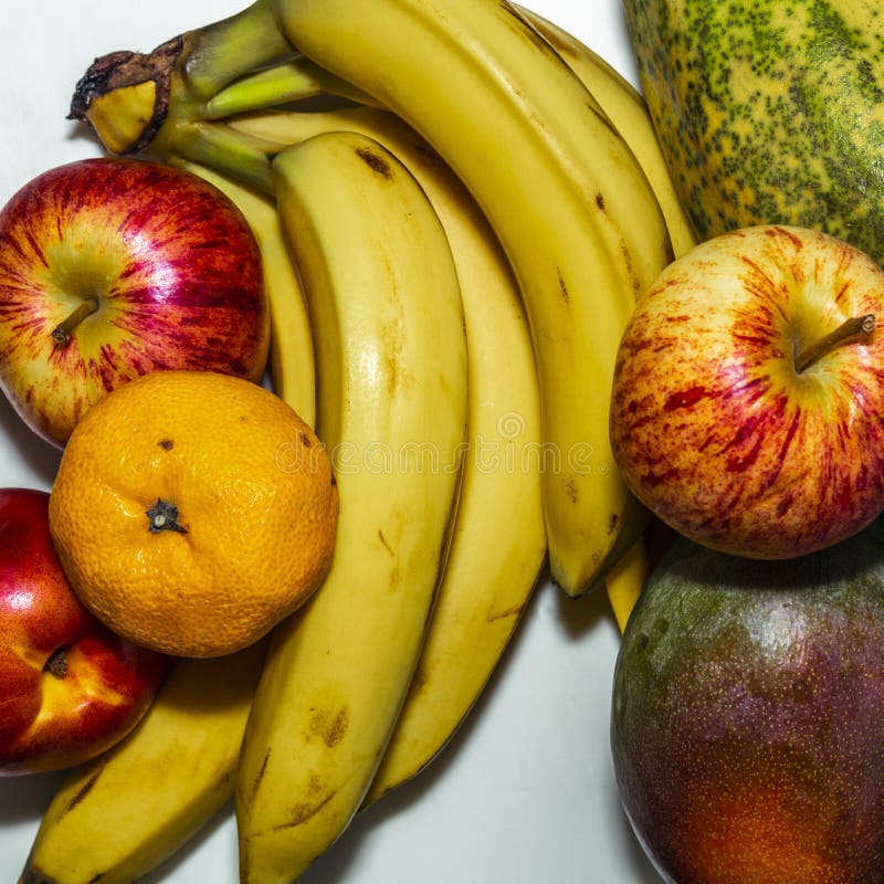 Several Pieces of Fresh Fruit with a White Background Stock Photo ...