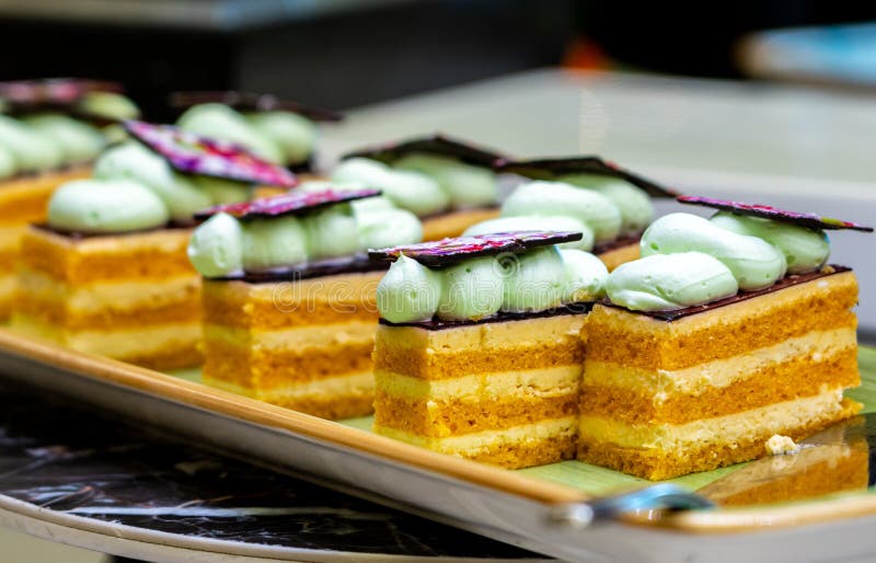 Several Puff Small Pieces of Cakes on a Plate Stock Image - Image of ...