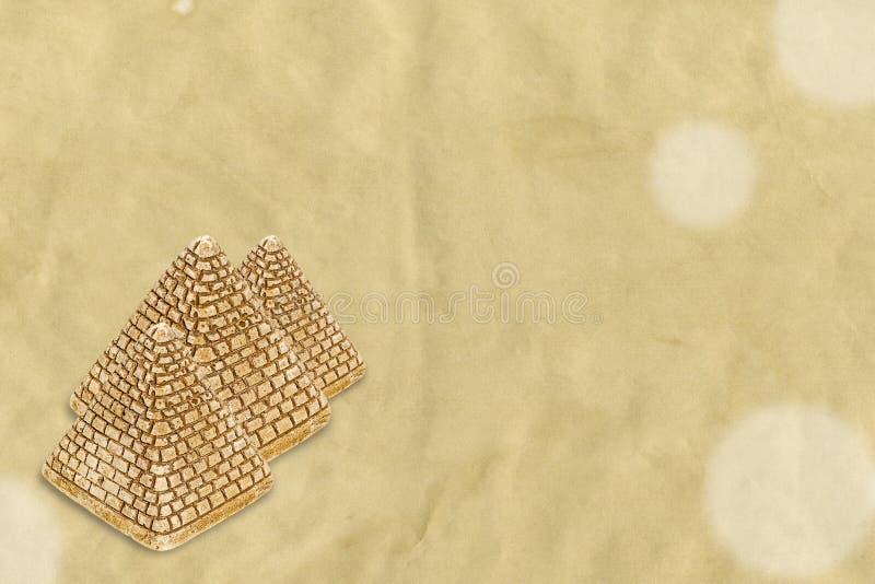 Several Pyramids of Sand on Obsolete Paper with Bokeh. Background ...