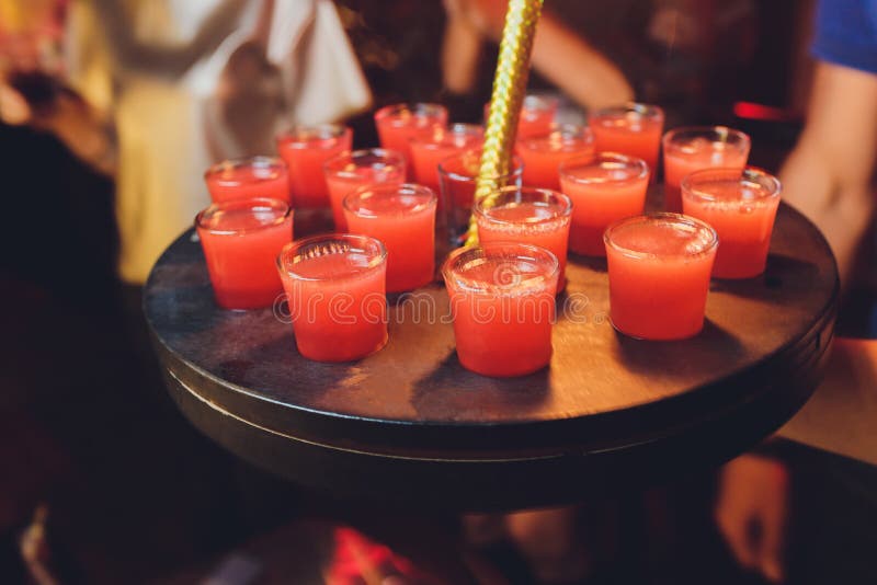 Several Red Alcohol Shots on a Bar. Stock Photo - Image of addiction ...