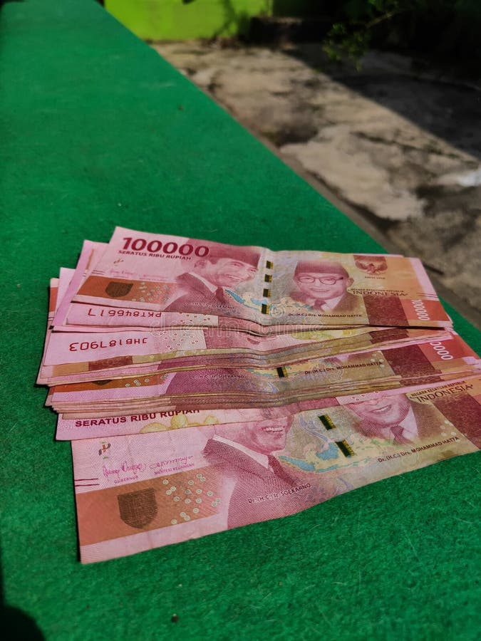 Several Red Bills Photographed at Various Angles Stock Image - Image of ...