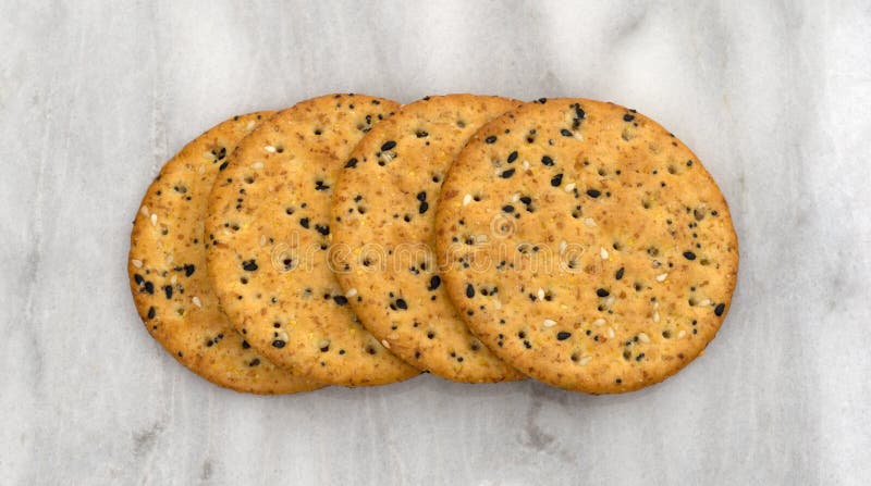 Several Multi Grain Crackers on a Cutting Board Stock Photo - Image of ...