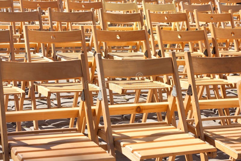 Several Rows of Empty Wooden Folding Chairs Stock Image - Image of line ...