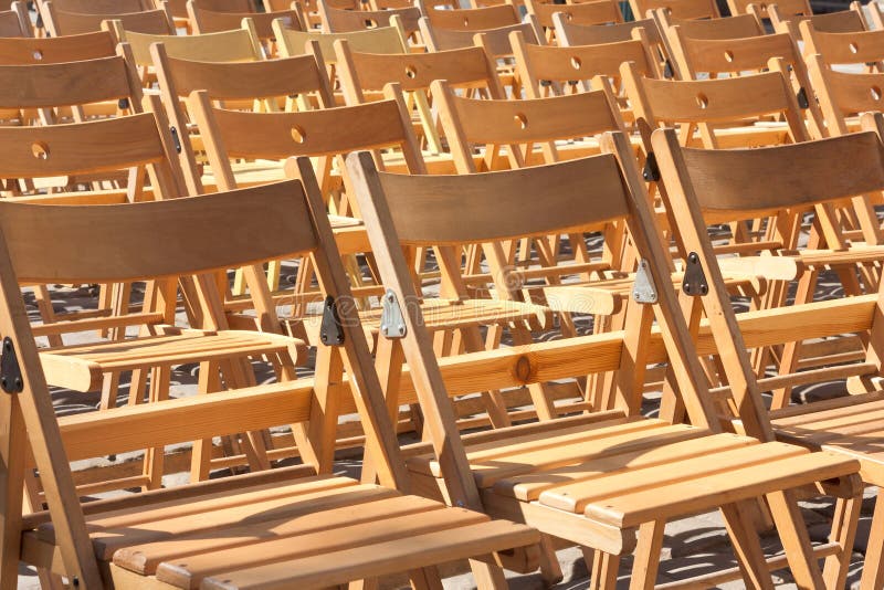 Several Rows of Empty Wooden Folding Chairs Stock Image - Image of ...