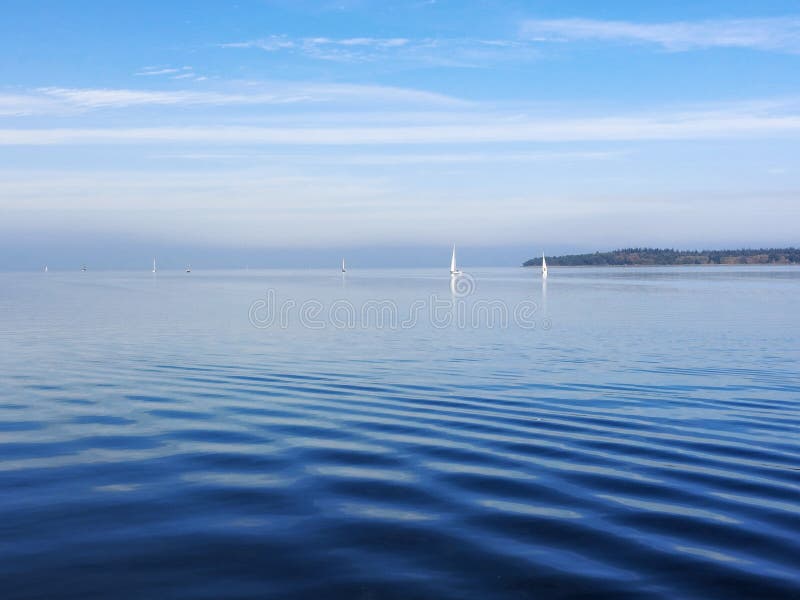 Several Sailing Ships in the Distance at the German Coast Stock Photo ...