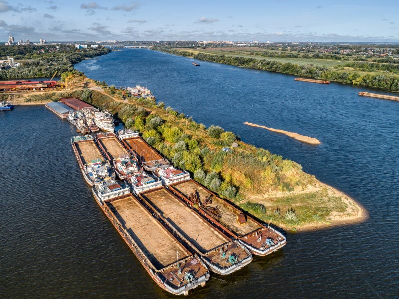 Several Self-propelled Barges Stand at the River Pier. Stock Photo ...