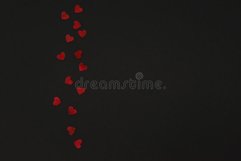 Several Small Hearts Made of Wood Stand in a Row Stock Photo - Image of ...