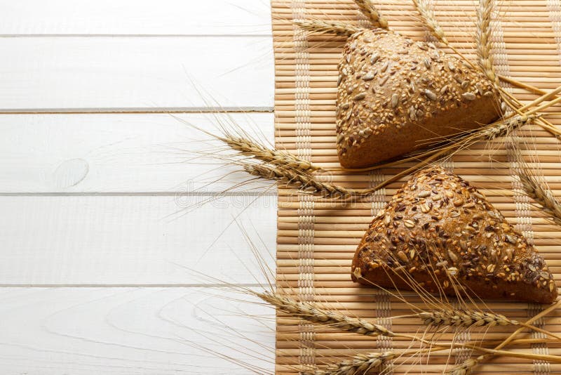 Several Small Multi Grain Triangular Shaped Bread Sprinkled with Whole ...