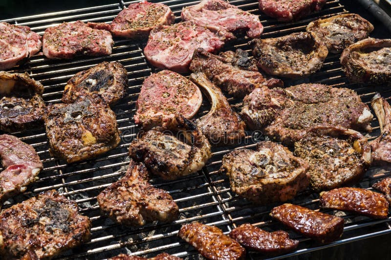 Several Sorts of Meat on a Barbecue Stock Photo - Image of meat, fire ...