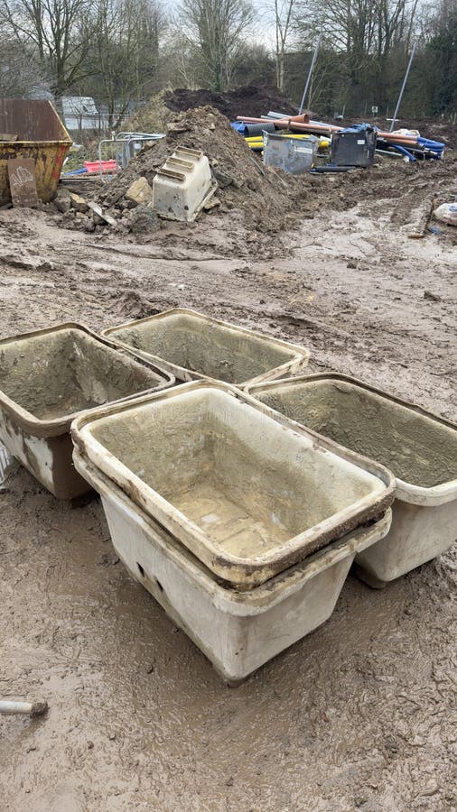 Muddy Plastic Containers at Construction Site Stock Image - Image of ...