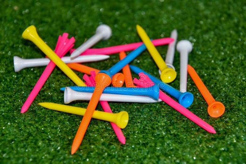 Several Tees on the Golf Putting Green Stock Photo - Image of ball ...