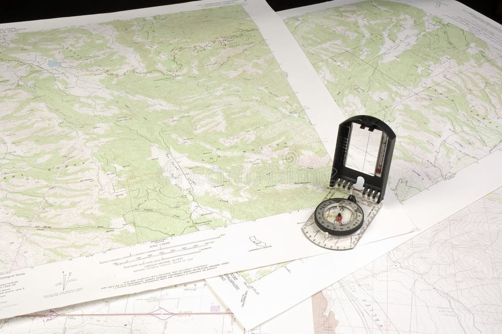 Several Topo Maps and Compass Stock Photo - Image of survival ...