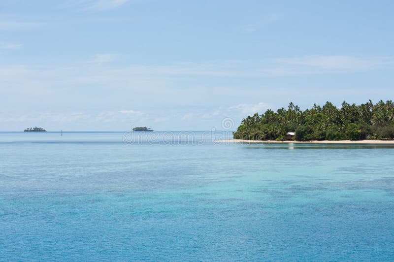 Several Tropical Islands with Palm Trees and Huts in Tonga Stock Photo ...