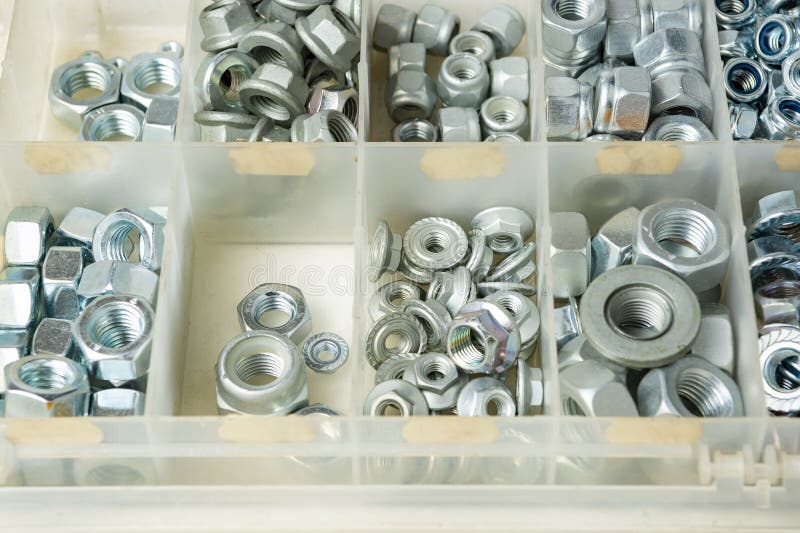 Several Types of Nuts in Open Compartments of Storage Box on Table in ...