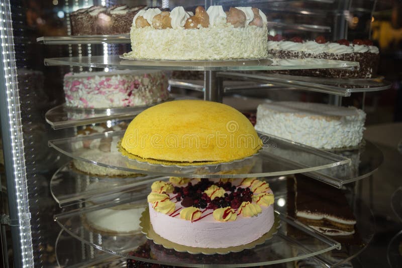 Several Types of Stuffed Cakes Inside a Pastry Display Stand Stock ...