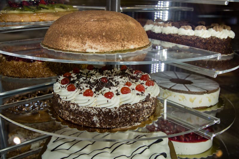 Several Types of Stuffed Cakes Inside a Pastry Display Stand Stock ...