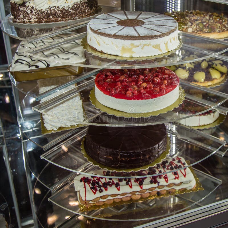 Several Types of Stuffed Cakes Inside a Pastry Display Stand Stock ...