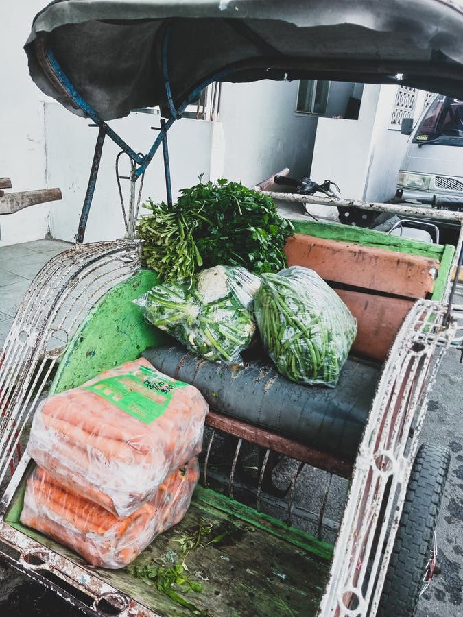 Several Types of Vegetables on an Old Pedicab are Transported To the ...
