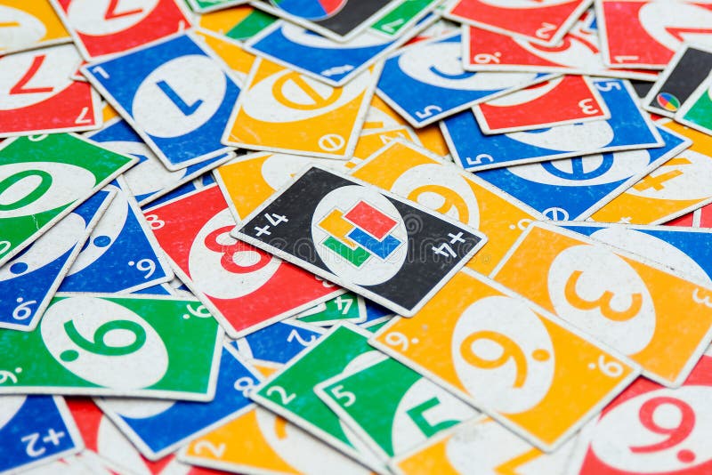 Several Uno Cards are Scattered, and in the Middle Four Stand Out Ones ...