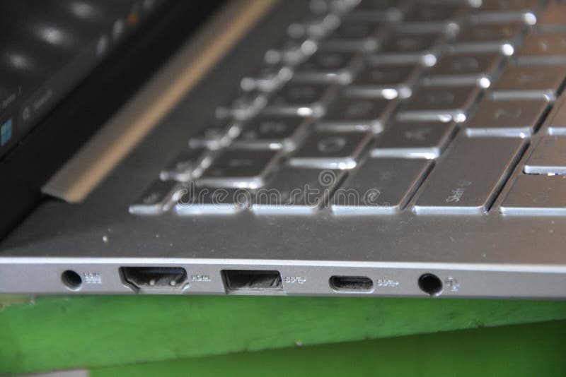 Several USB Ports and an Ethernet Port on the Side of the Laptop ...