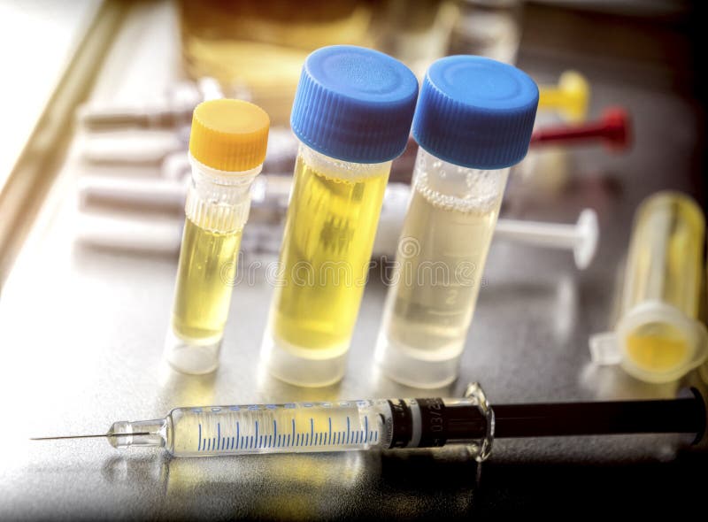 Several Vials and Syringe in Laboratory Stock Image - Image of bottle ...