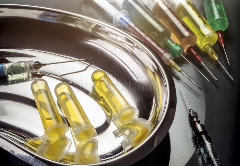 Several Vials and Syringe in Laboratory Stock Image - Image of metal ...