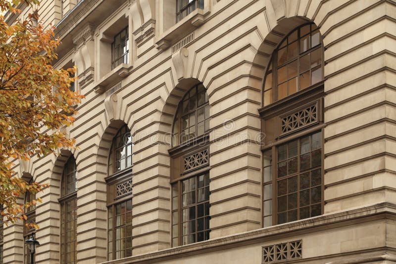 Several Vintage Arch Windows in a Brick Antique Building Stock Image ...