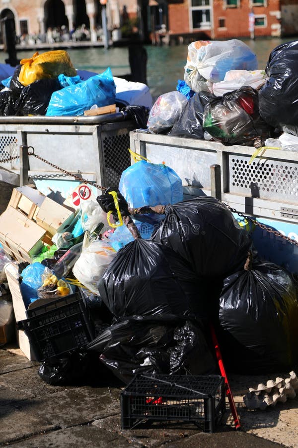 Waste Garbage Bags in an Overloaded Dumpster in the City Stock Photo ...
